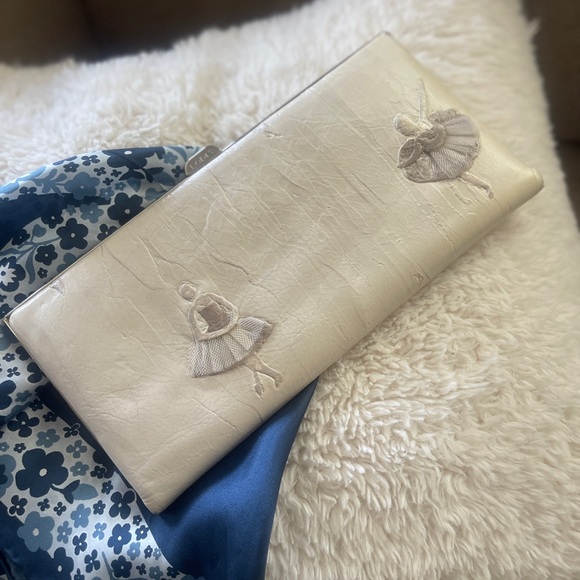 Lodis | Bags | Elegant Cream Clutch With Ballerina Design | Poshmark